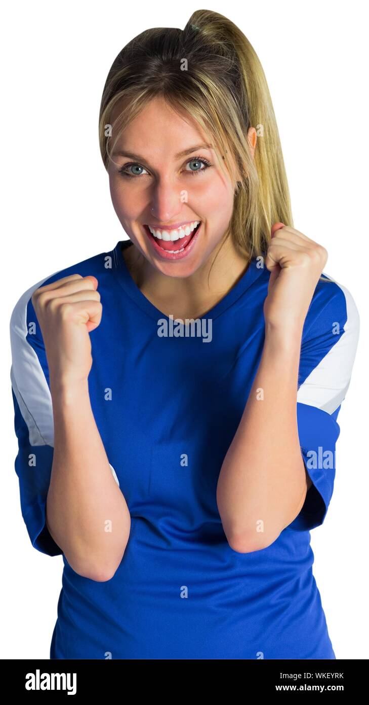 Cheering football fan in blue on white background Stock Photo - Alamy