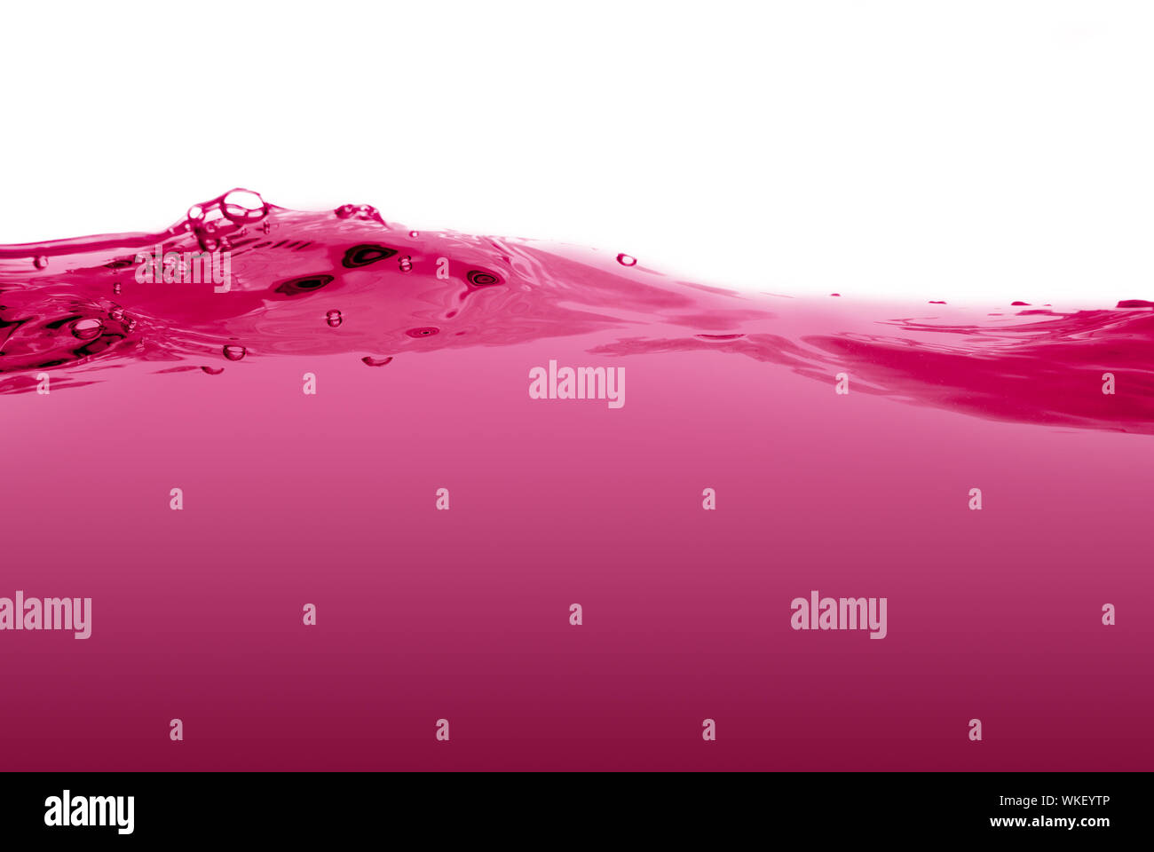 Pink liquid wave isolated on a white background Stock Photo - Alamy