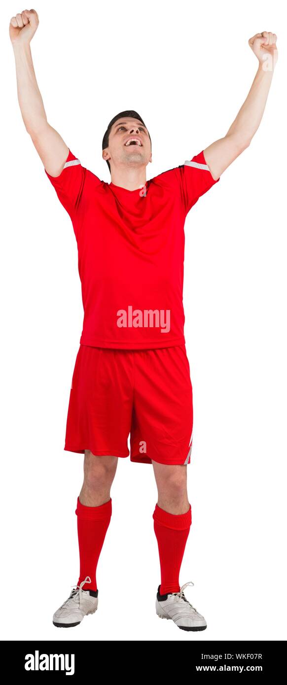 Excited young football player cheering on white background Stock Photo ...