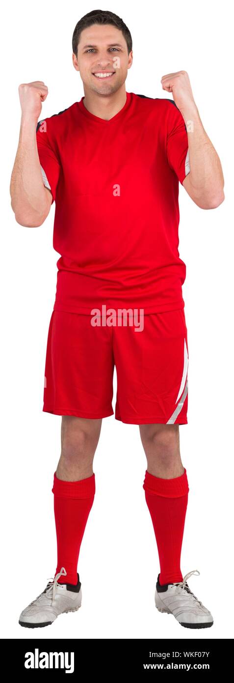 Excited young football player cheering on white background Stock Photo ...