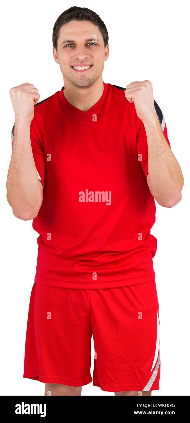 Excited young football player cheering on white background Stock Photo ...