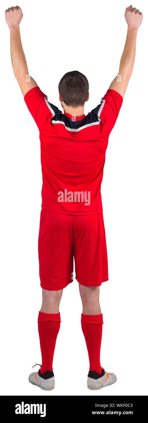 Excited young football player cheering on white background Stock Photo ...