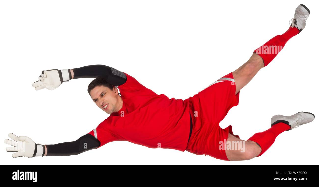 Fit goal keeper jumping up on white background Stock Photo - Alamy