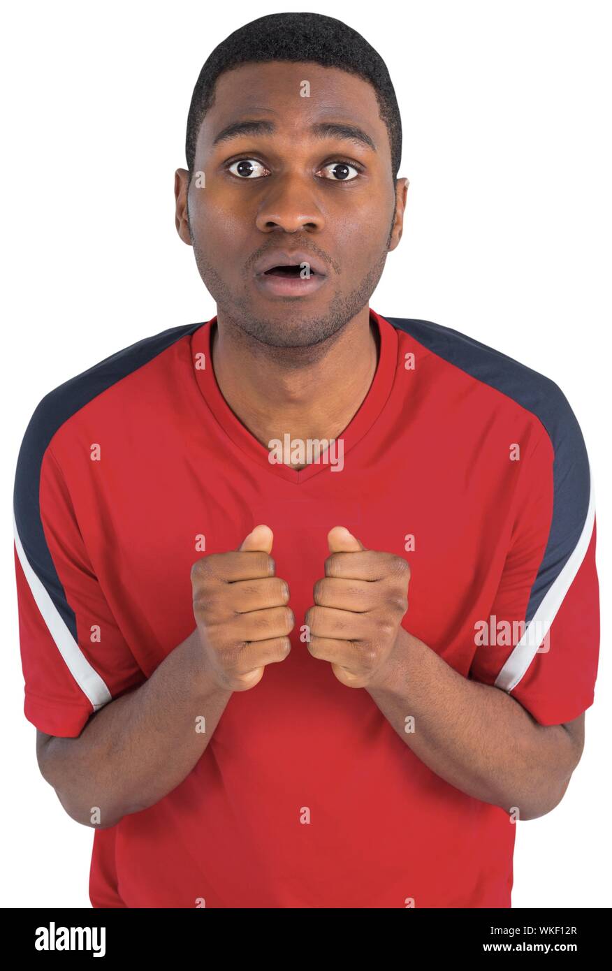 Nervous football fan looking ahead on white background Stock Photo - Alamy