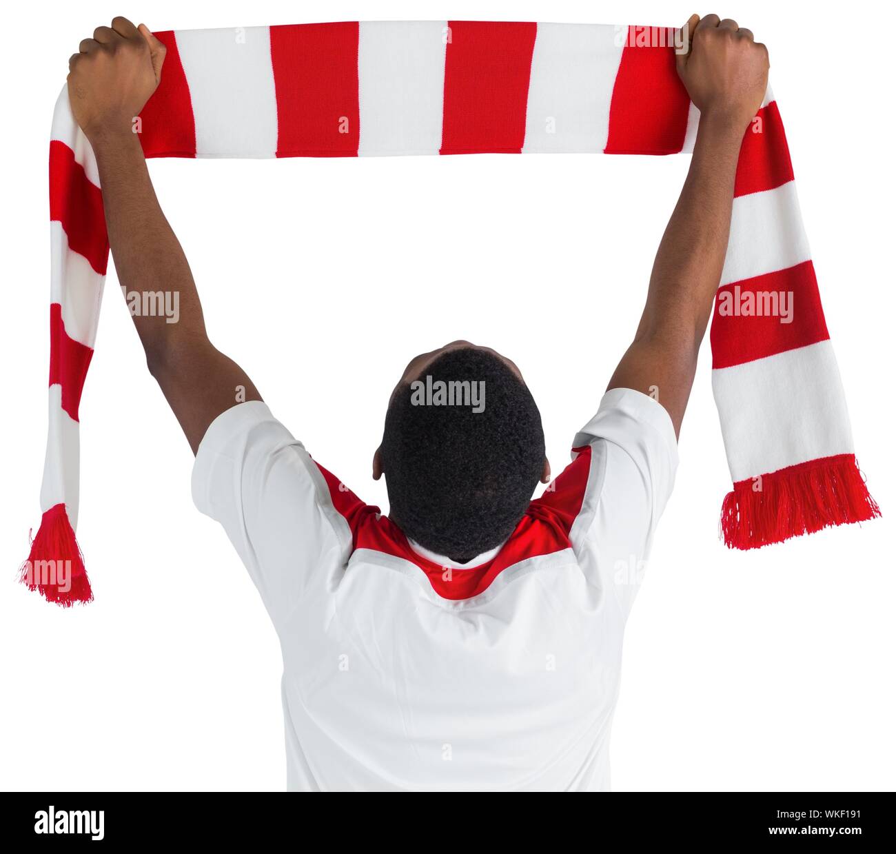Happy football fan waving scarf on white background Stock Photo - Alamy