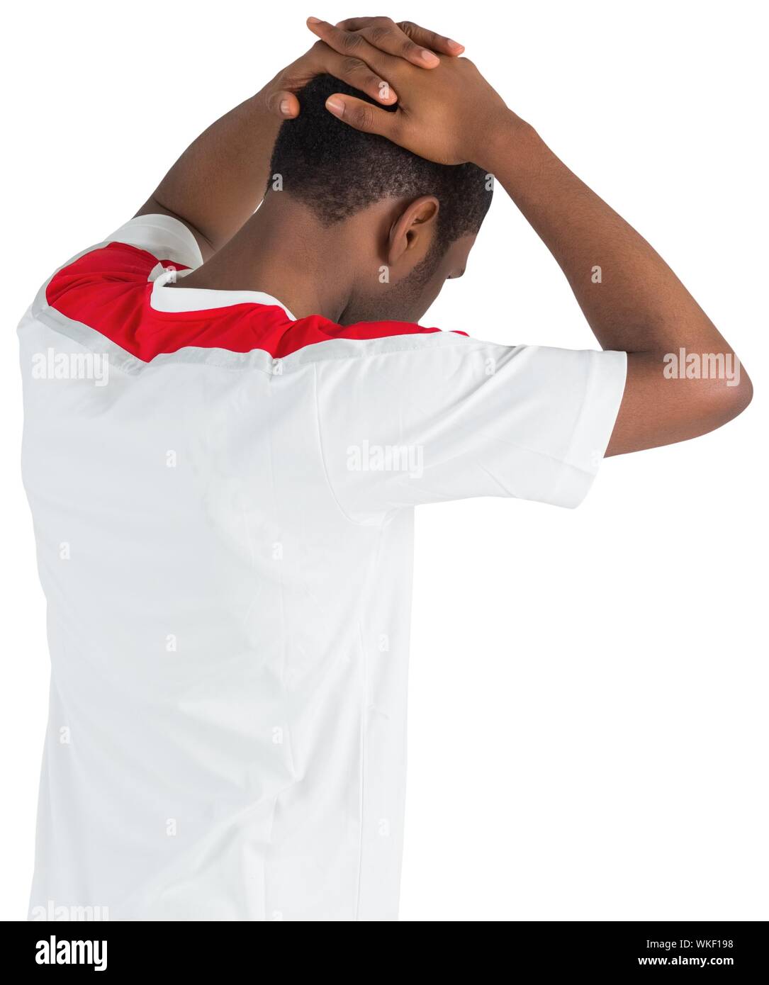 Disappointed football fan looking down on white background Stock Photo ...