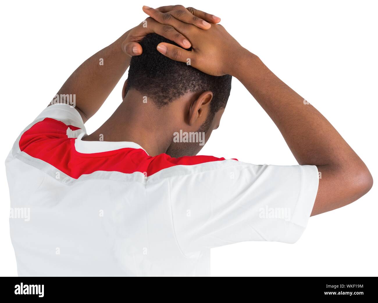 Disappointed football fan looking down on white background Stock Photo ...
