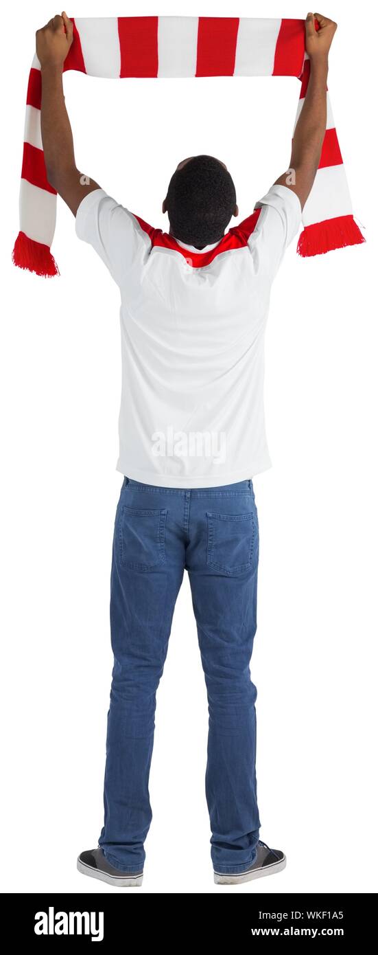 Happy football fan waving scarf on white background Stock Photo - Alamy