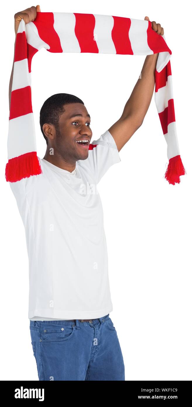 Happy football fan waving scarf on white background Stock Photo - Alamy