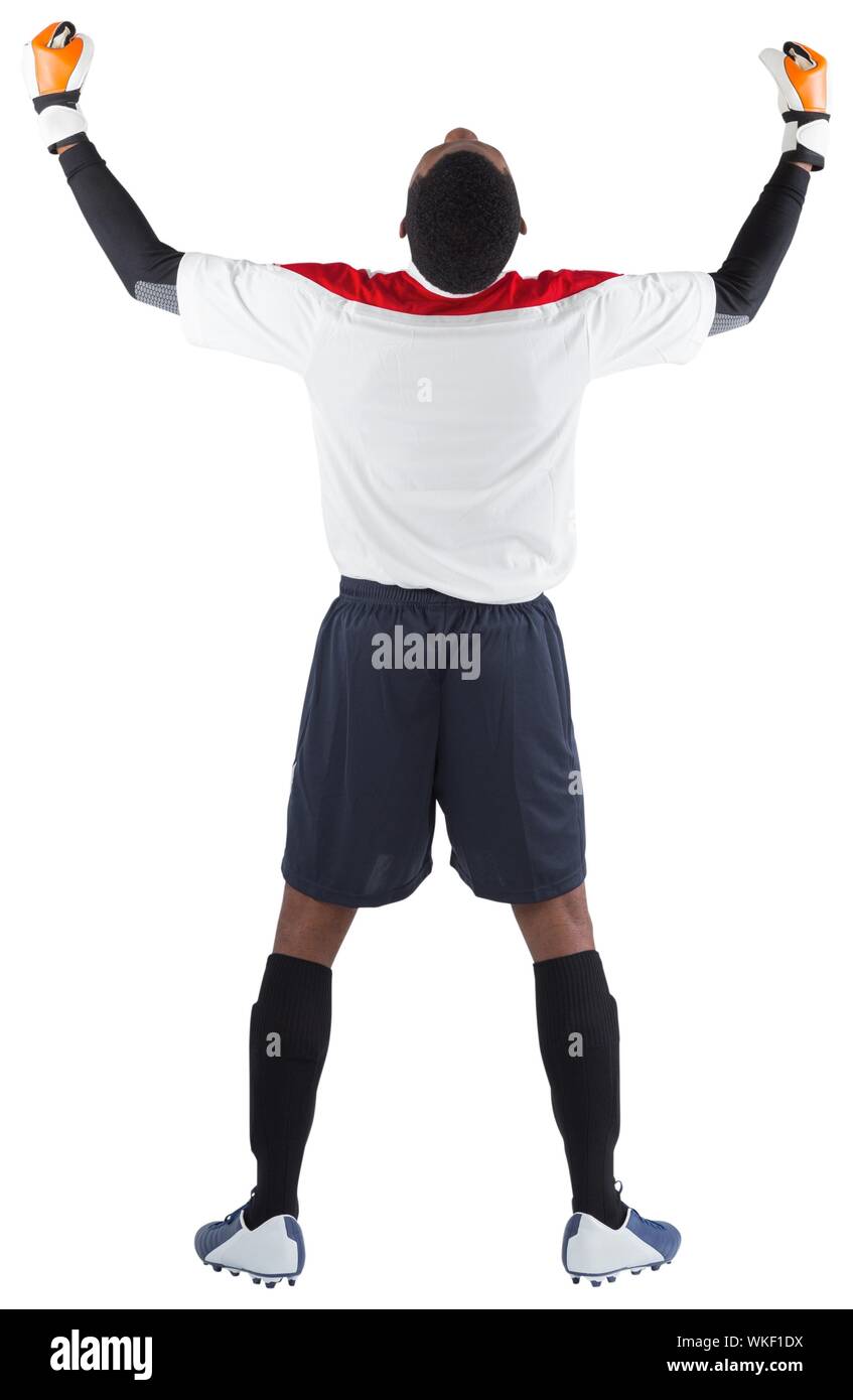 Excited goalkeeper in white cheering on white background Stock Photo ...