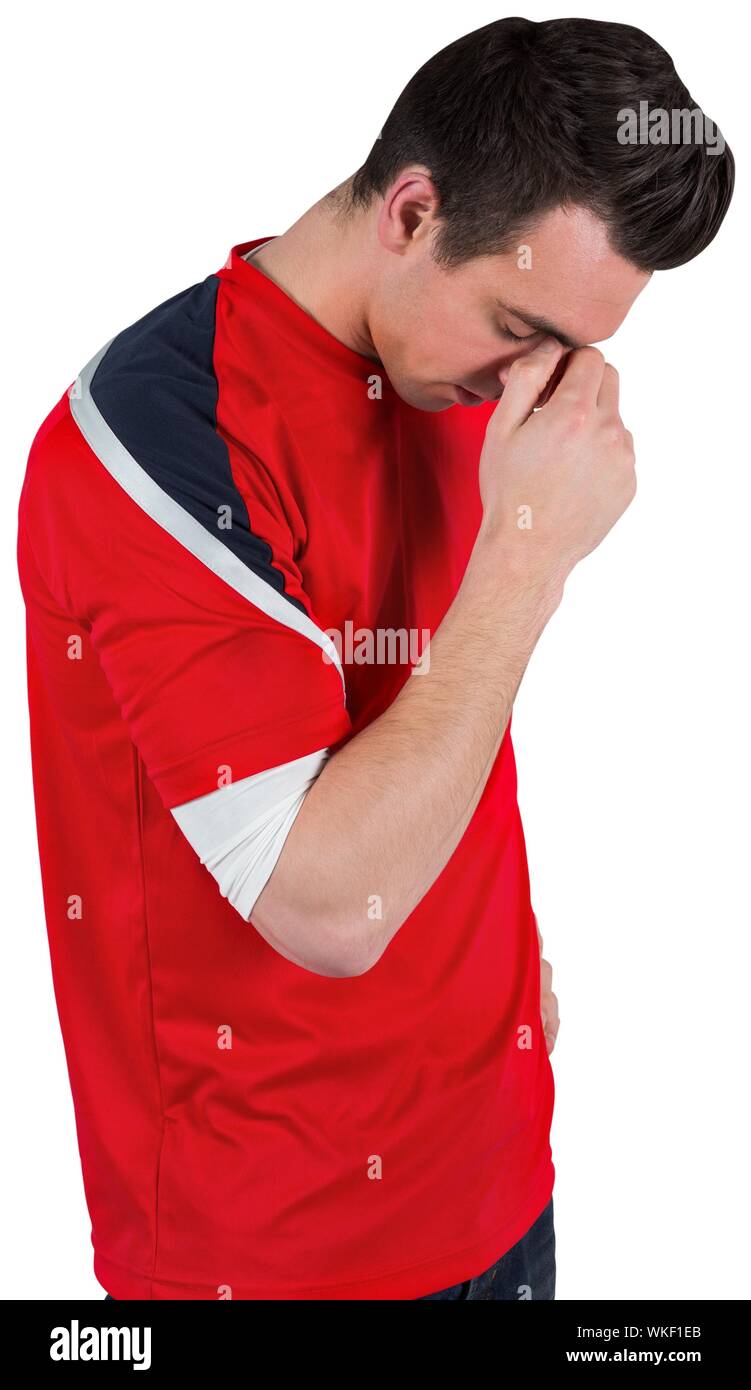 Disappointed football fan looking down on white background Stock Photo ...