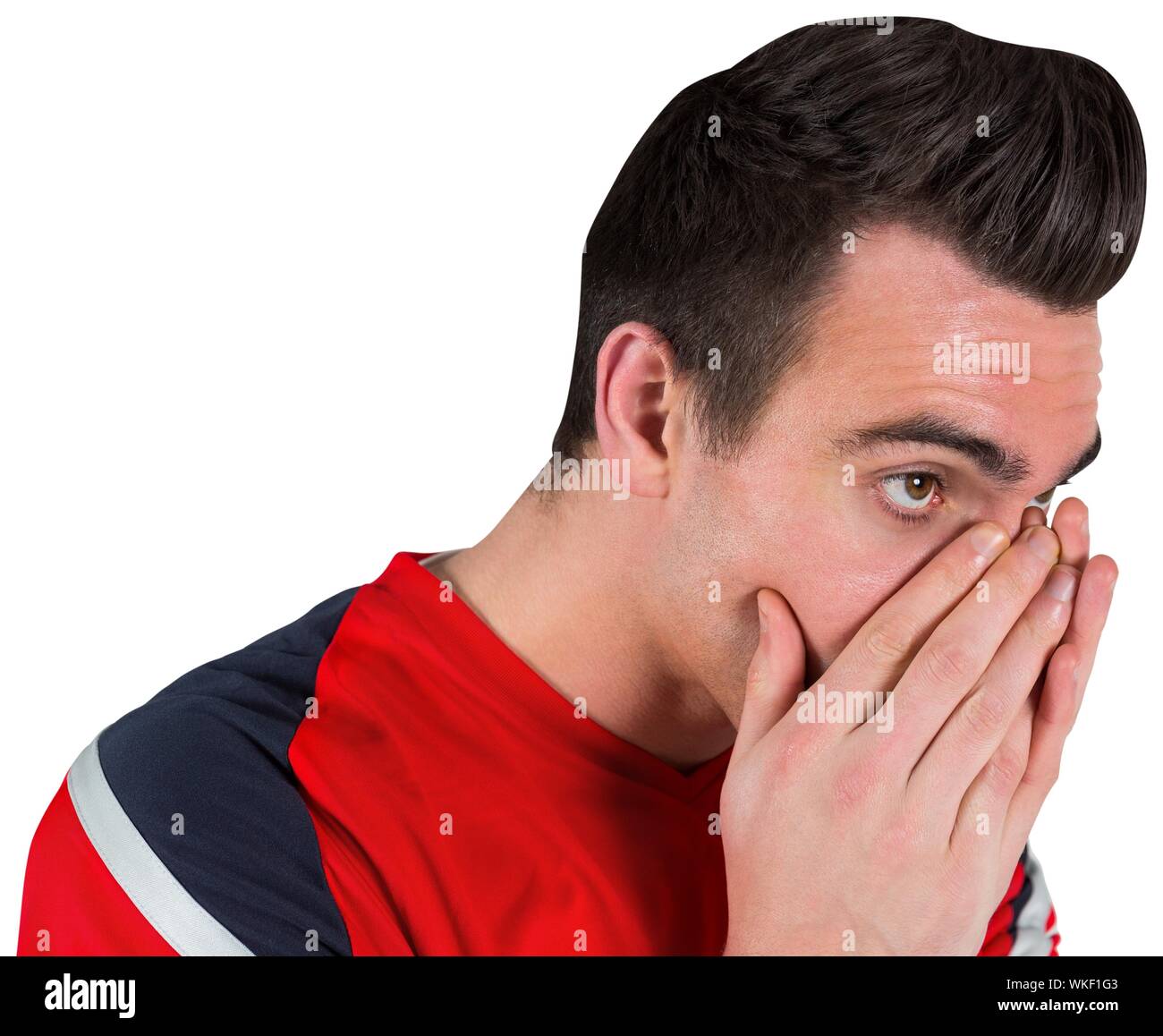 Nervous football fan looking ahead on white background Stock Photo - Alamy