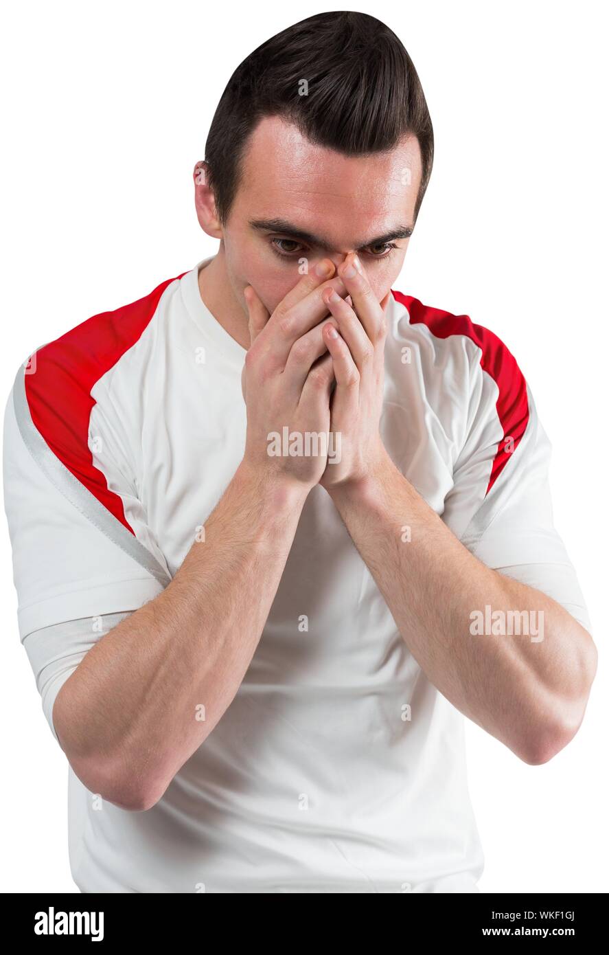 Disappointed football fan looking down on white background Stock Photo ...