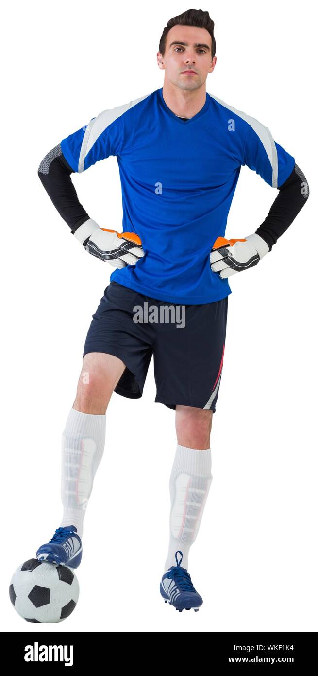 Handsome goalkeeper in blue jersey on white background Stock Photo - Alamy