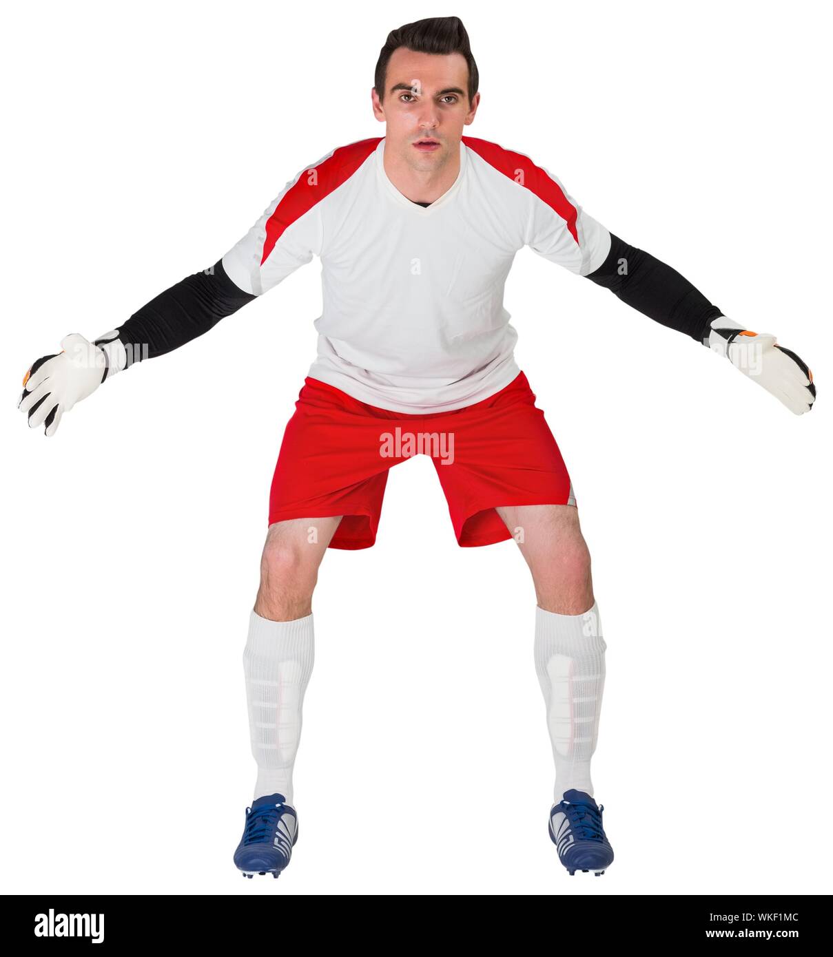 Goalkeeper in white ready to save on white background Stock Photo - Alamy