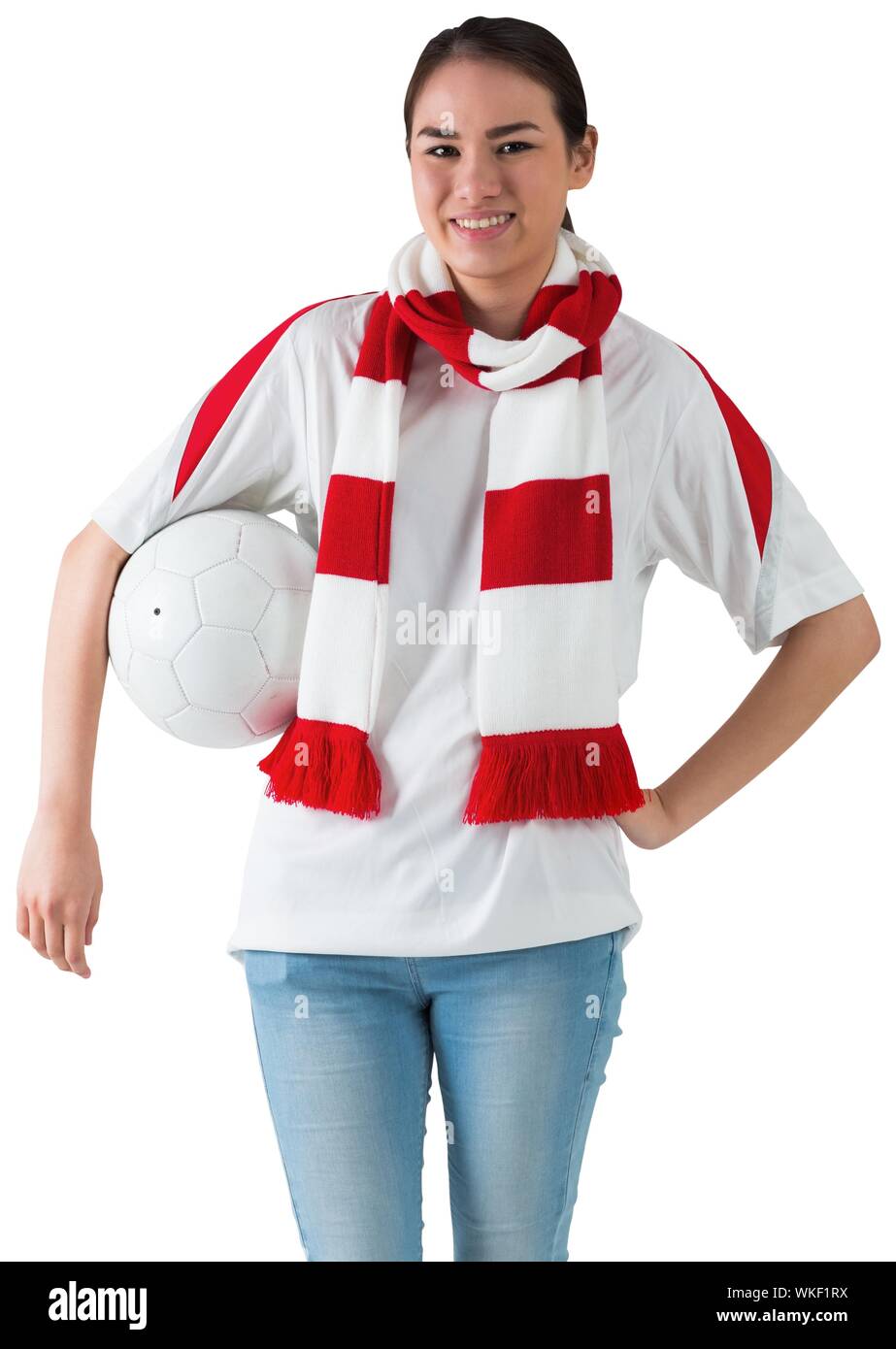 Football fan in white wearing scarf holding ball on white background ...