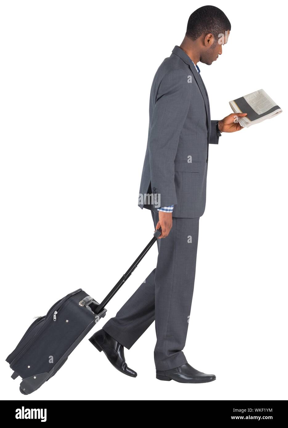 Young businessman pulling his suitcase on white background Stock Photo ...