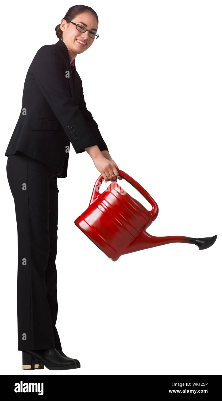 Businesswoman using red watering can on white background Stock Photo ...