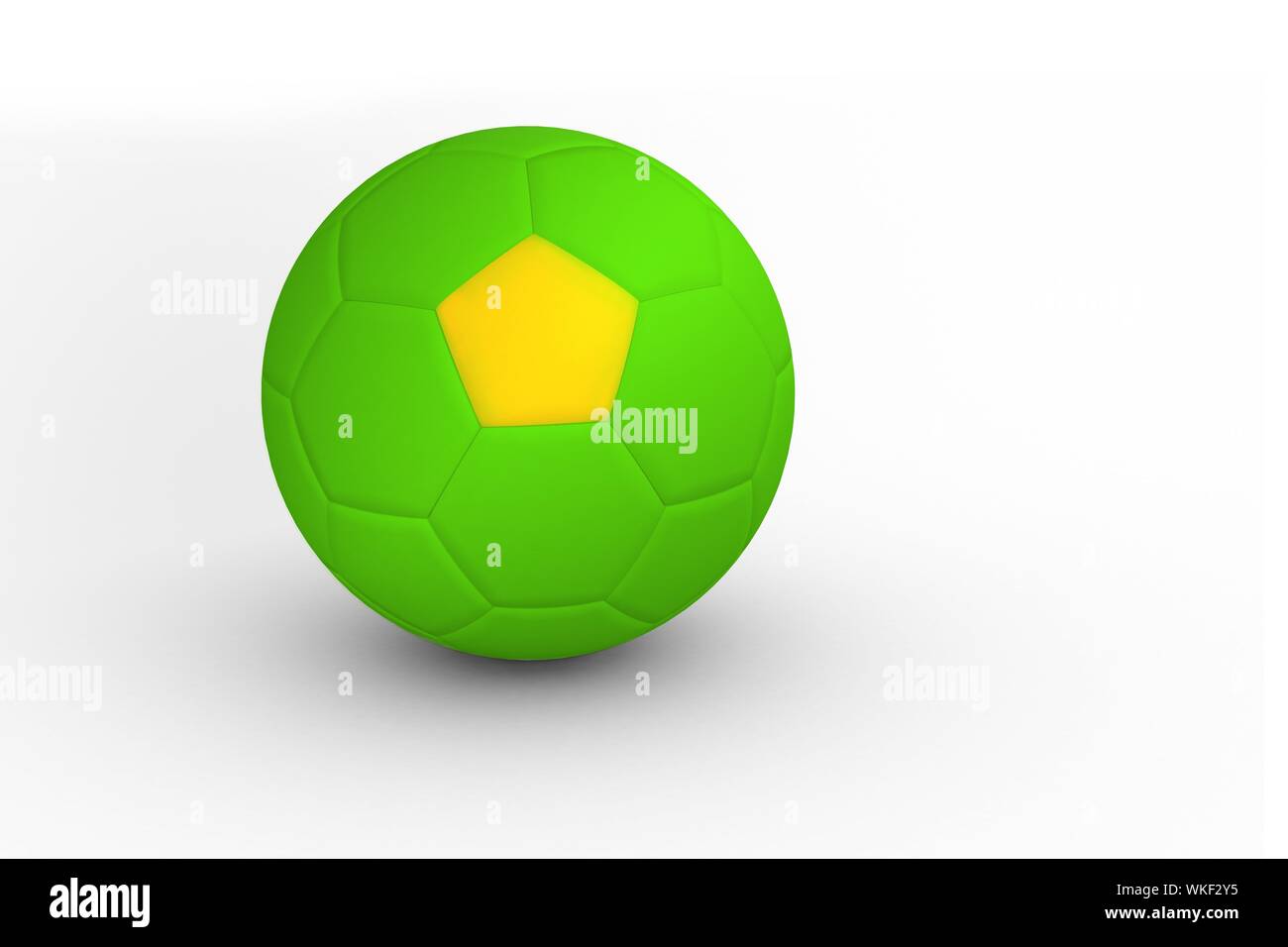 Bright green and yellow football on white background Stock Photo - Alamy