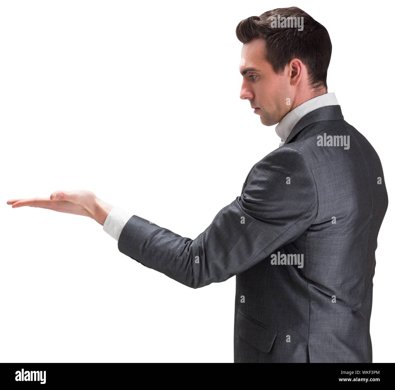Businessman presenting with hand on white background Stock Photo - Alamy