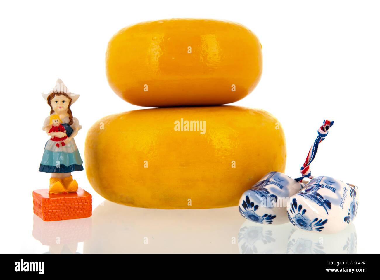 Typical dutch cheese with souvenir and wooden shoes Stock Photo - Alamy