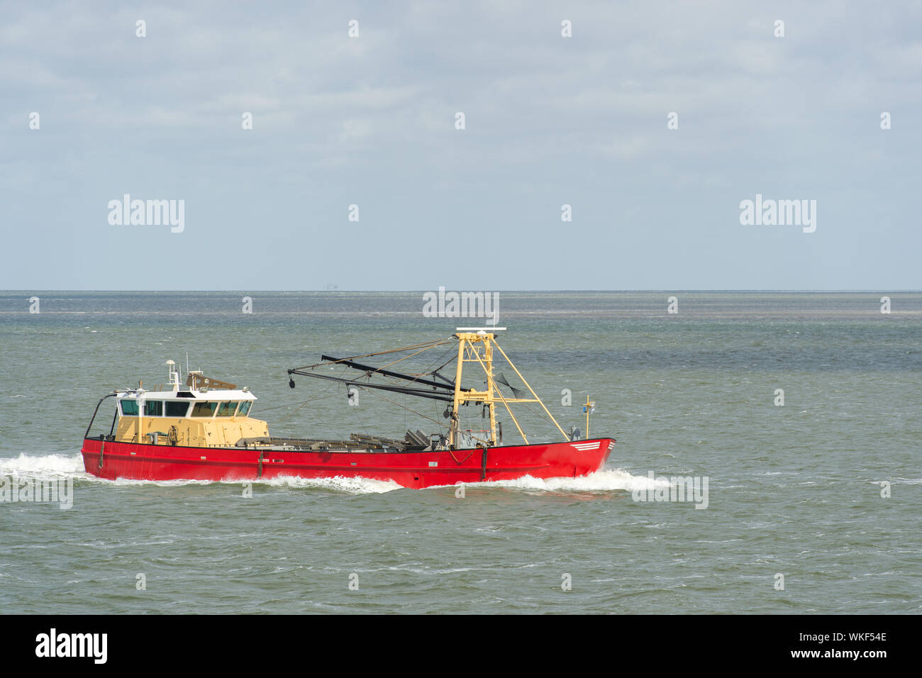 Red Dutch fishing trawler at wadden sea Stock Photo - Alamy