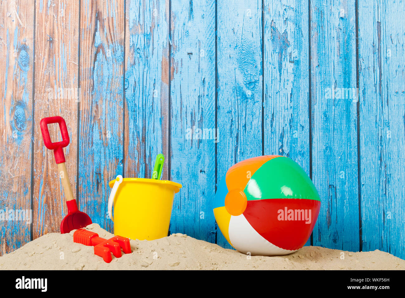 Toys in sand at the beach Stock Photo - Alamy