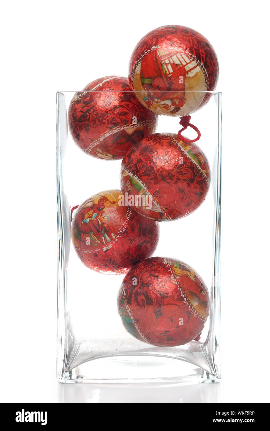 Christmas decorative balls in glass jar isolated on white background ...