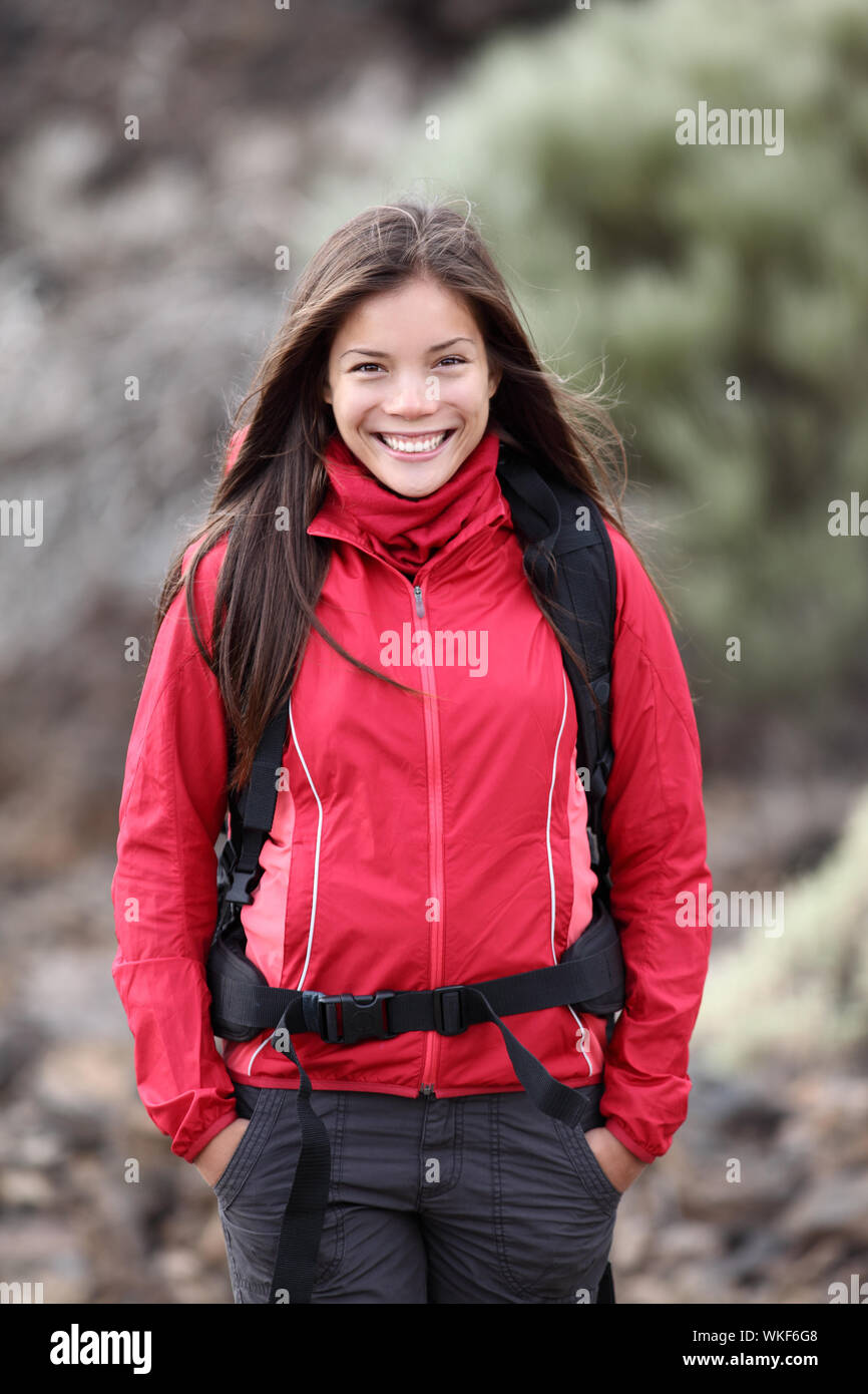 Outdoors woman portrait of young and beautiful hiking woman - very ...