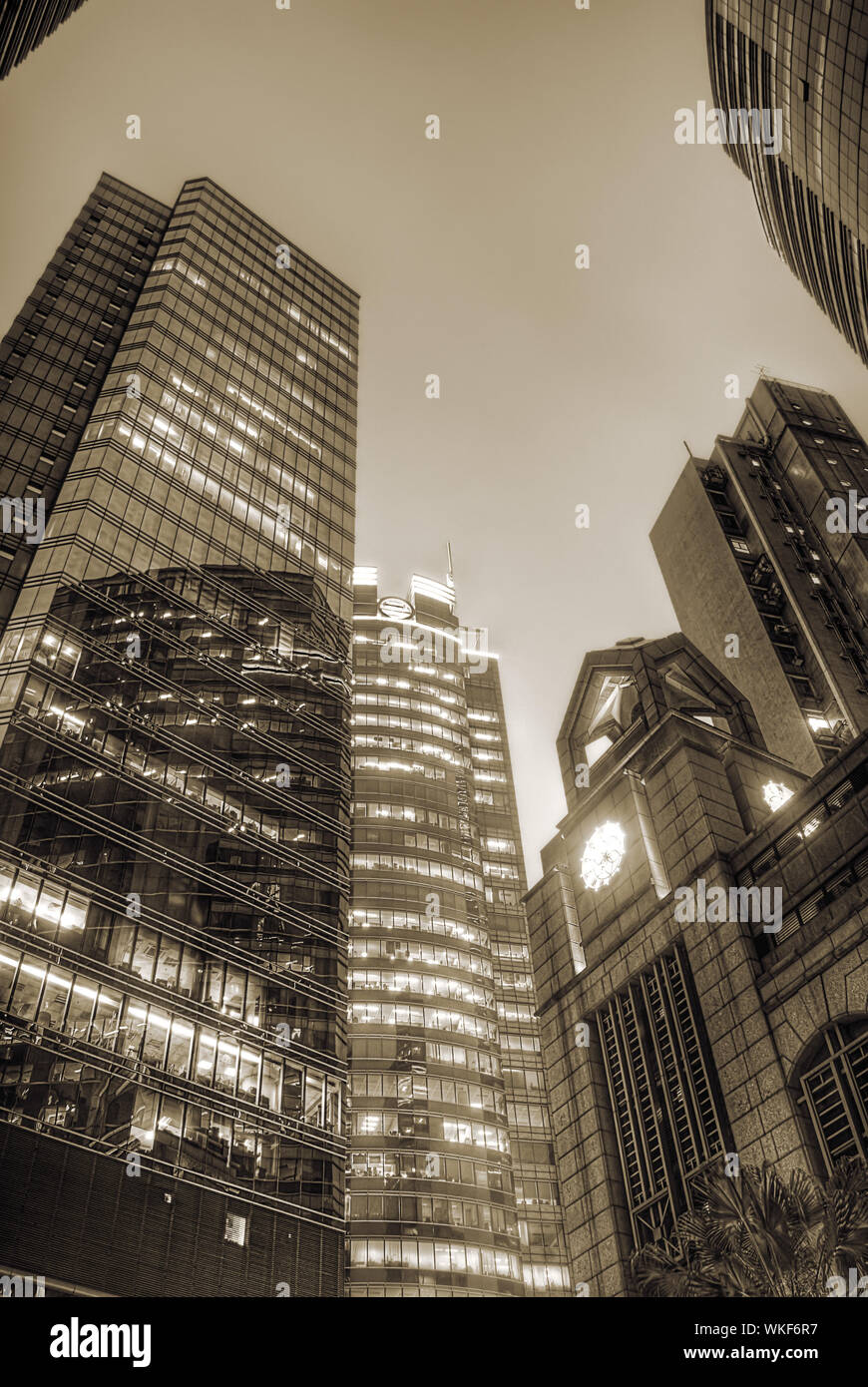 Corporate buildings at night with yellow color Stock Photo - Alamy