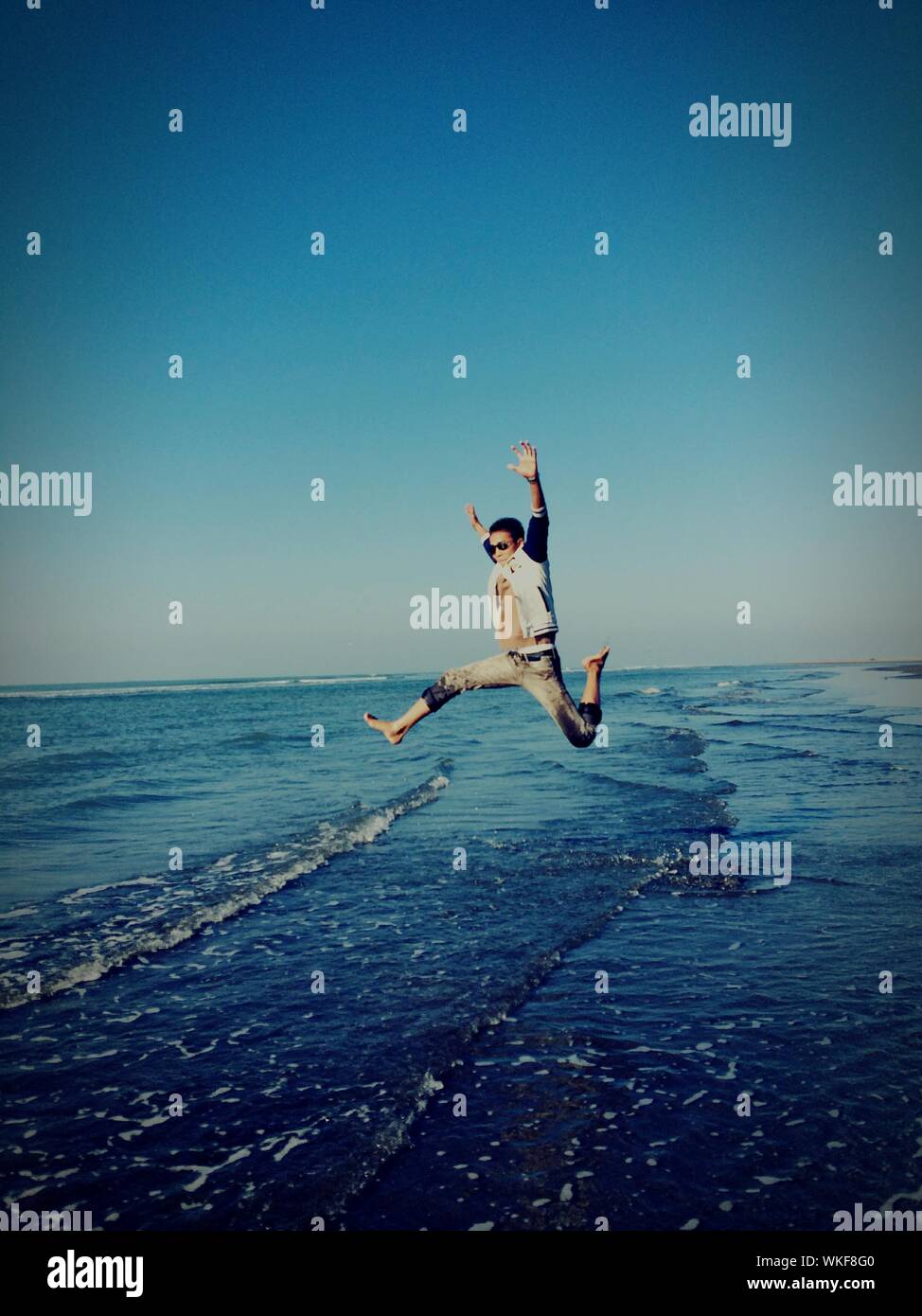 Indian man jumping hi-res stock photography and images - Alamy