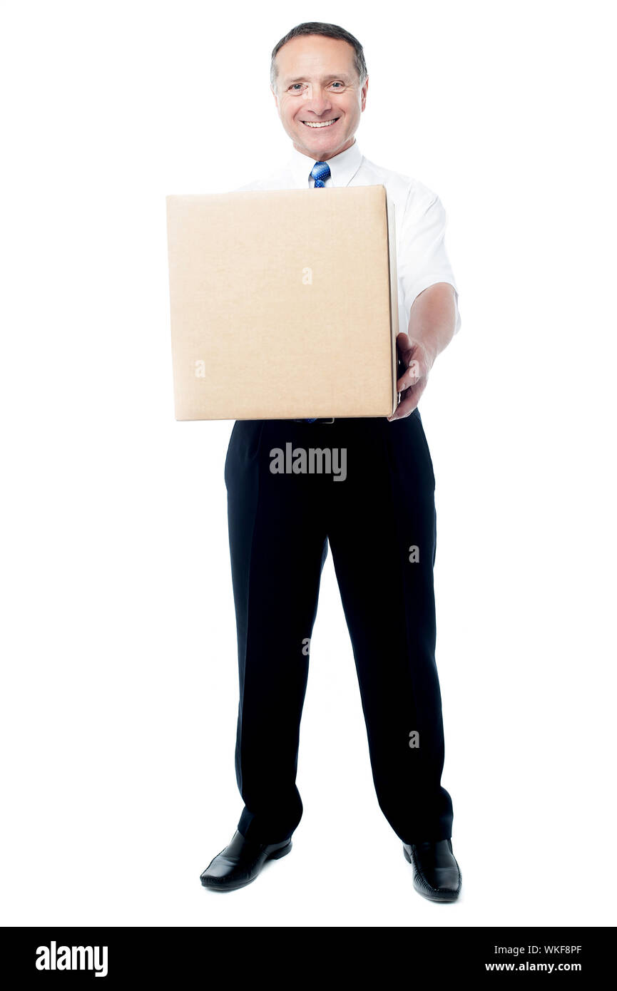 Man holding cardboard box on white background Stock Photo - Alamy