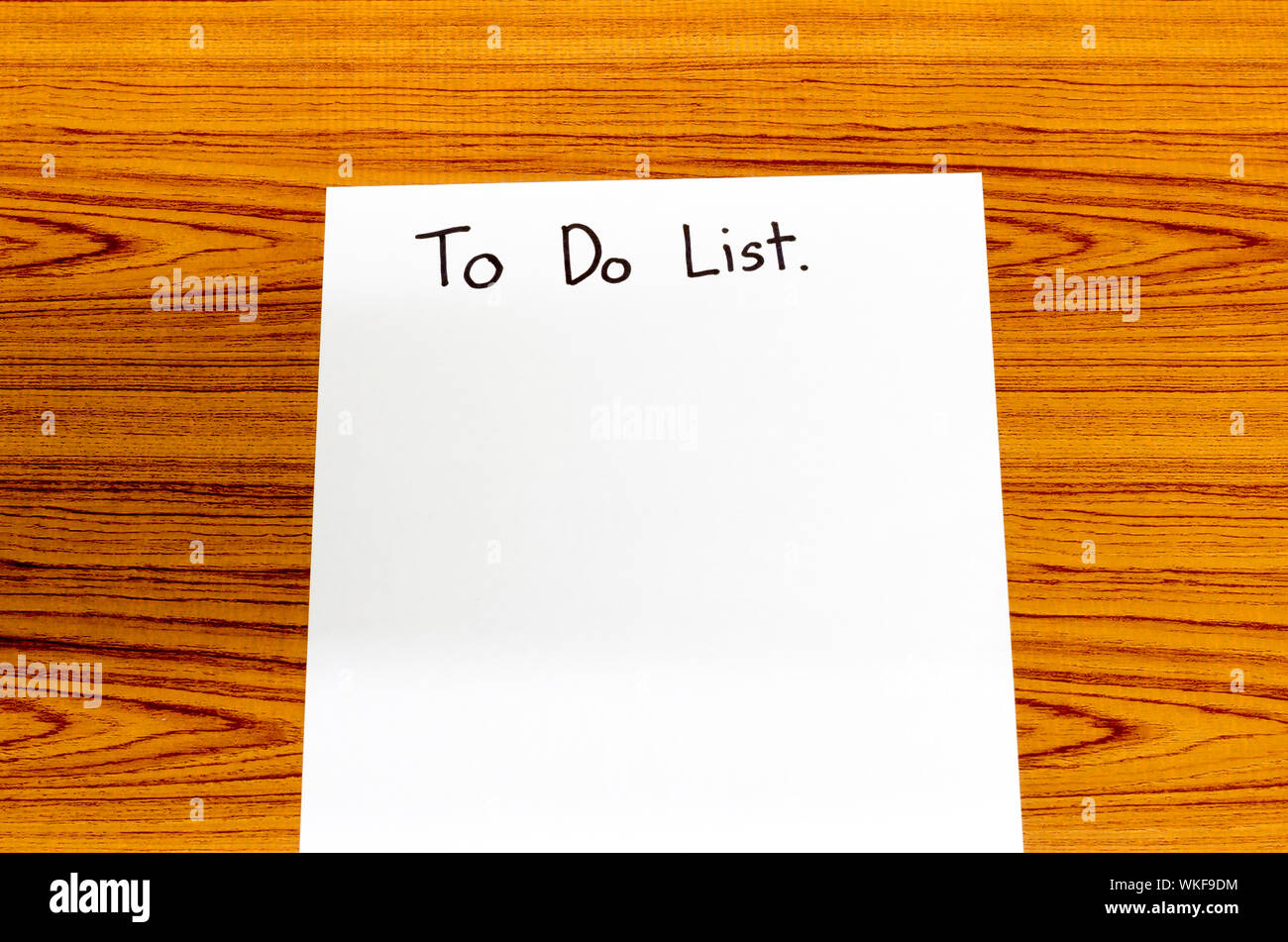 paper write to do list word on wood background Stock Photo - Alamy