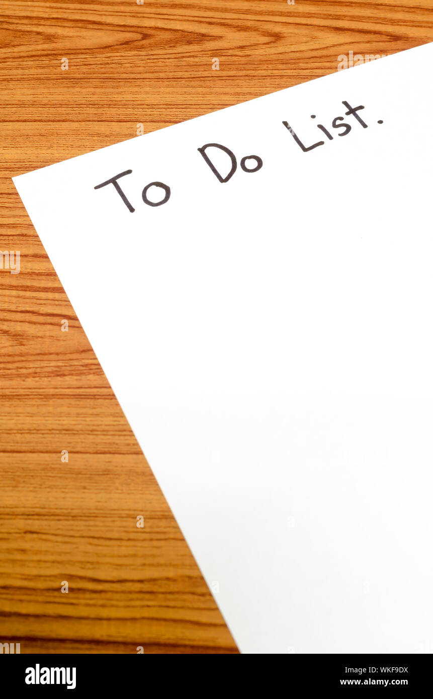 paper write to do list word on wood background Stock Photo - Alamy