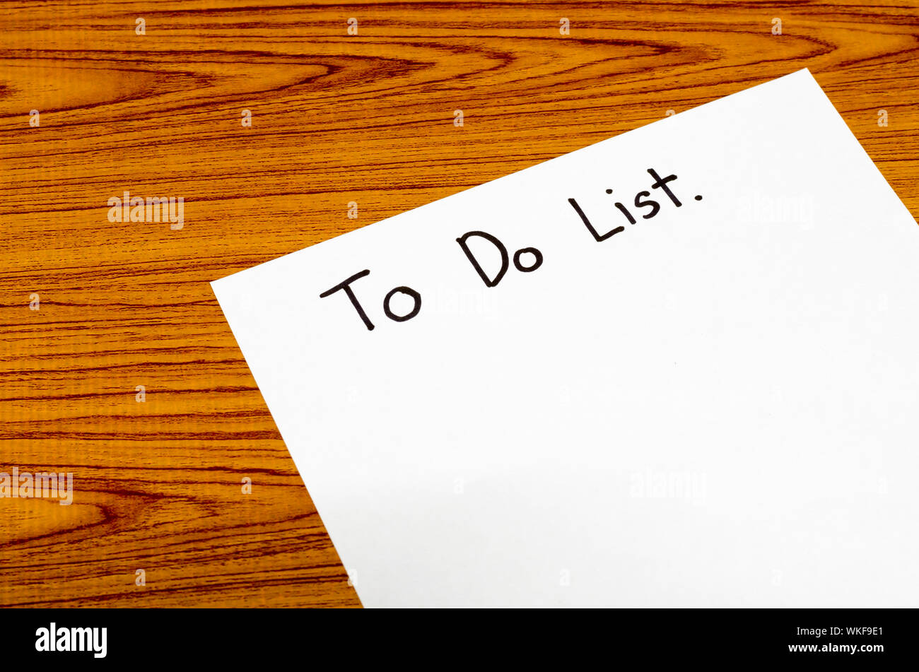 paper write to do list word on wood background Stock Photo - Alamy