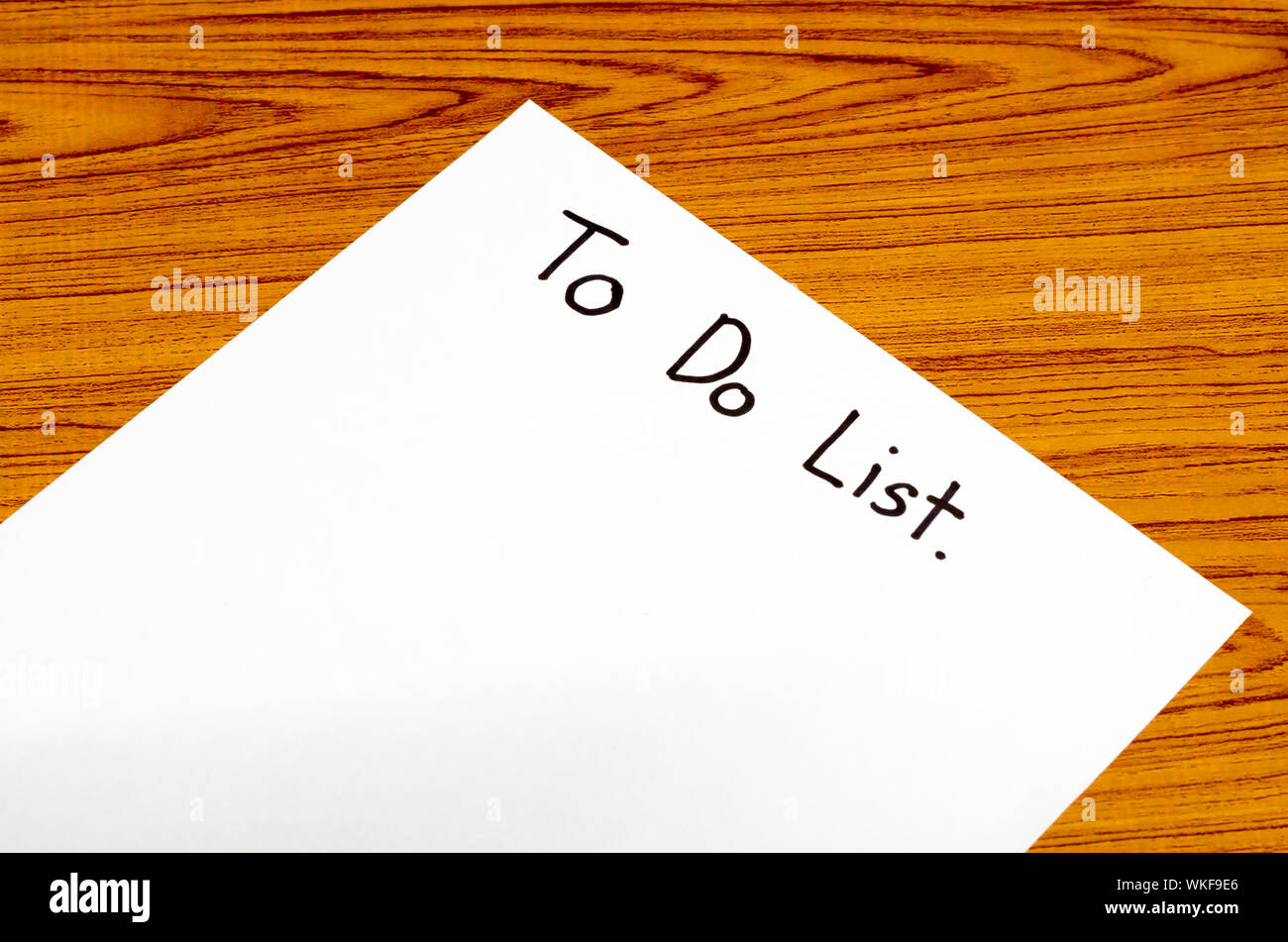 paper write to do list word on wood background Stock Photo - Alamy