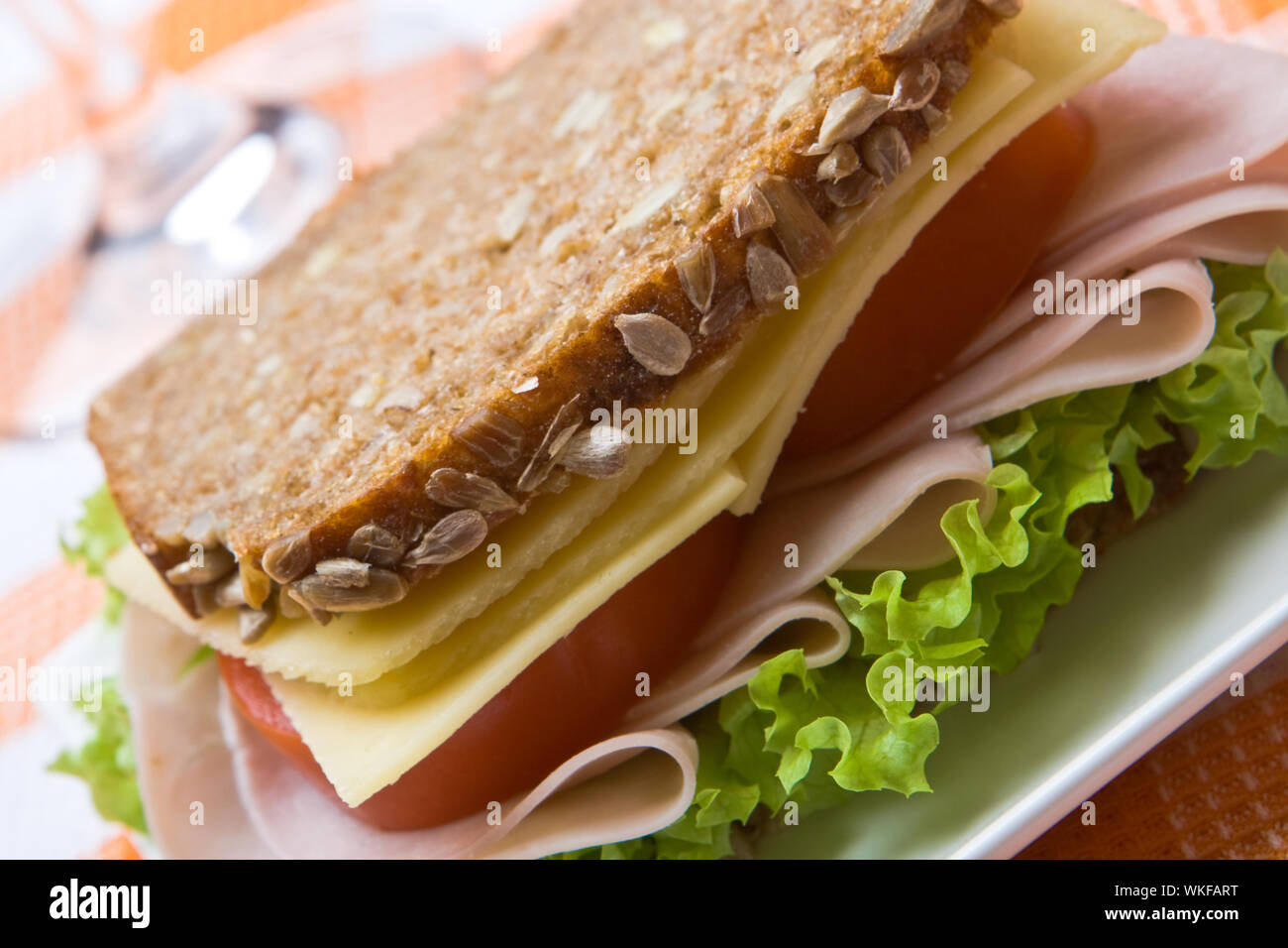Fresh wholemeal cheese, ham and tomato sandwich Stock Photo - Alamy