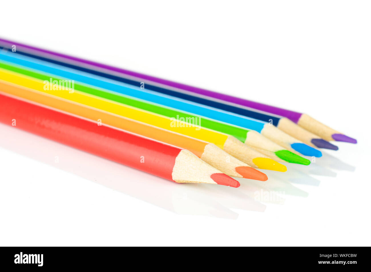 Group of seven whole colored pencil rainbow colors isolated on white ...