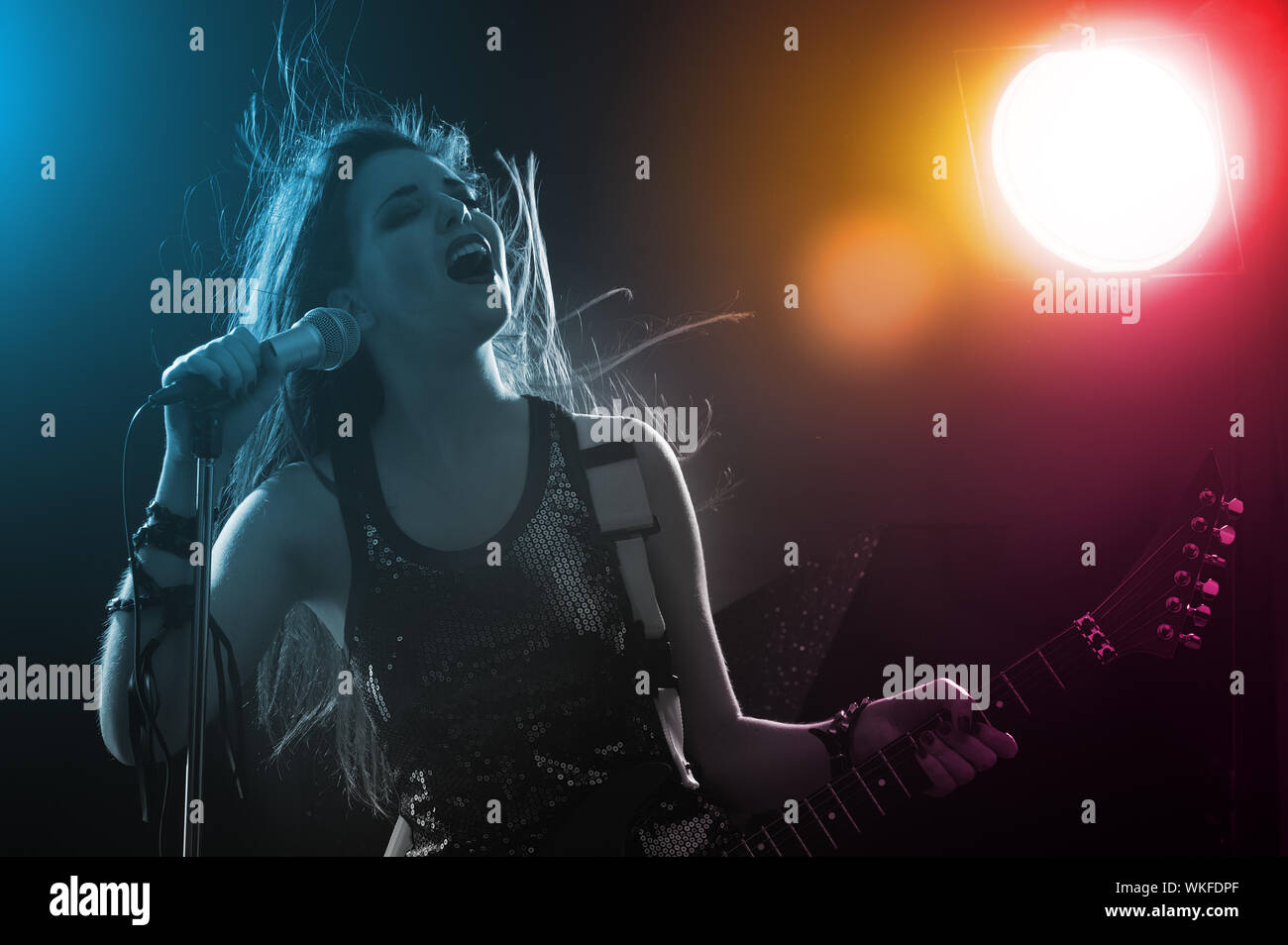 Teenager singing on stage talent show hi-res stock photography and ...