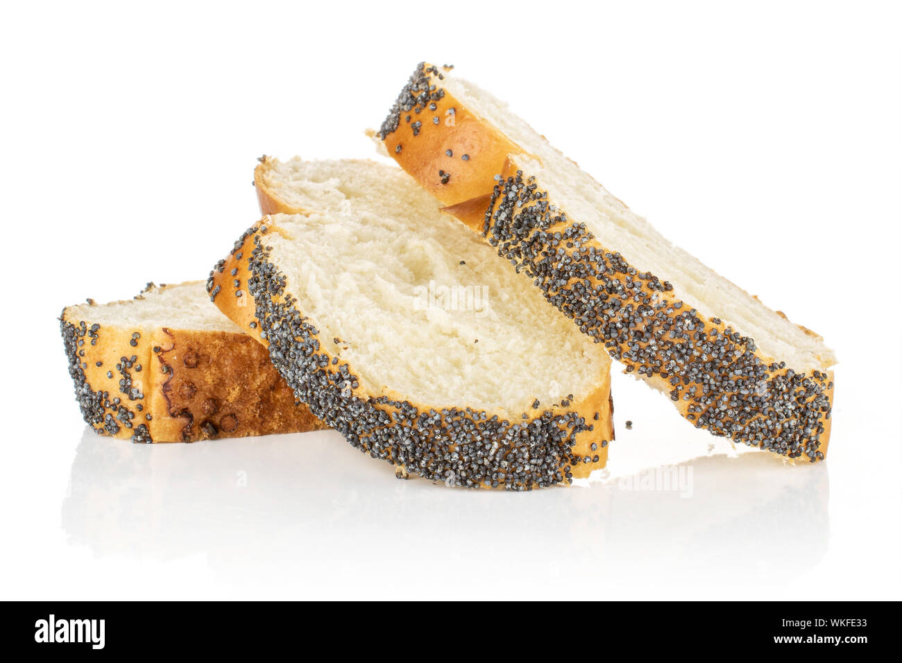 Group of three slices of twisted poppy seed bun isolated on white ...