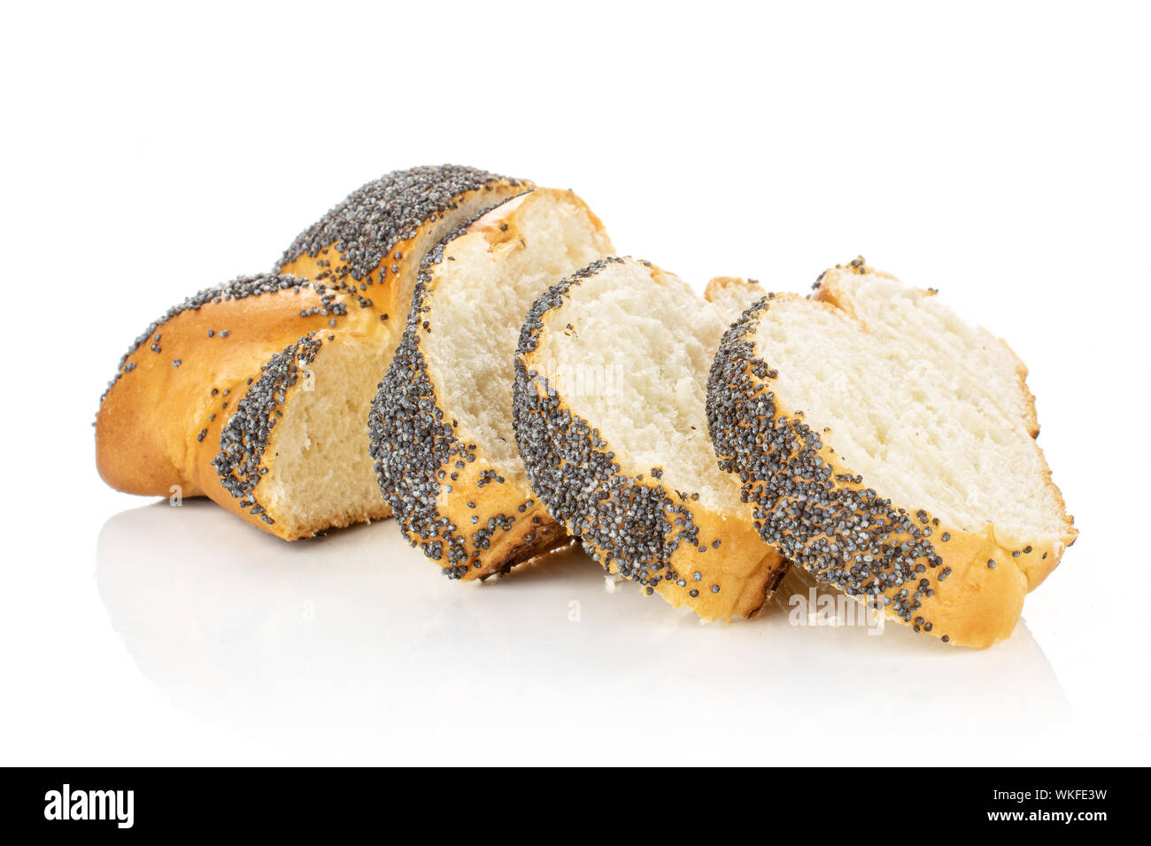 Group of one half three slices of twisted poppy seed bun one sliced ...