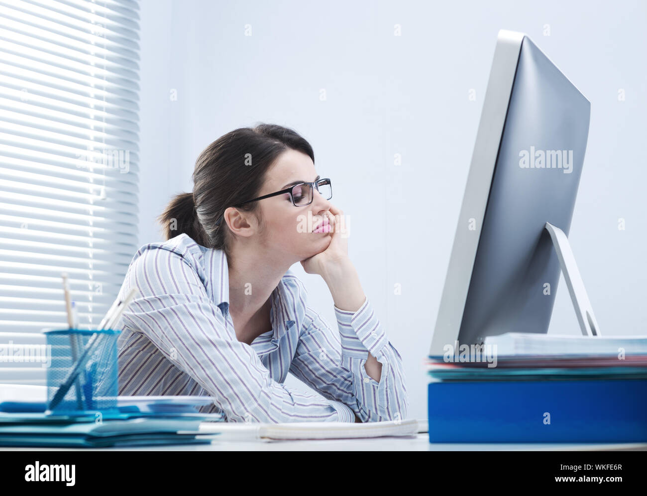 Bored office desk staring computer hi-res stock photography and images ...