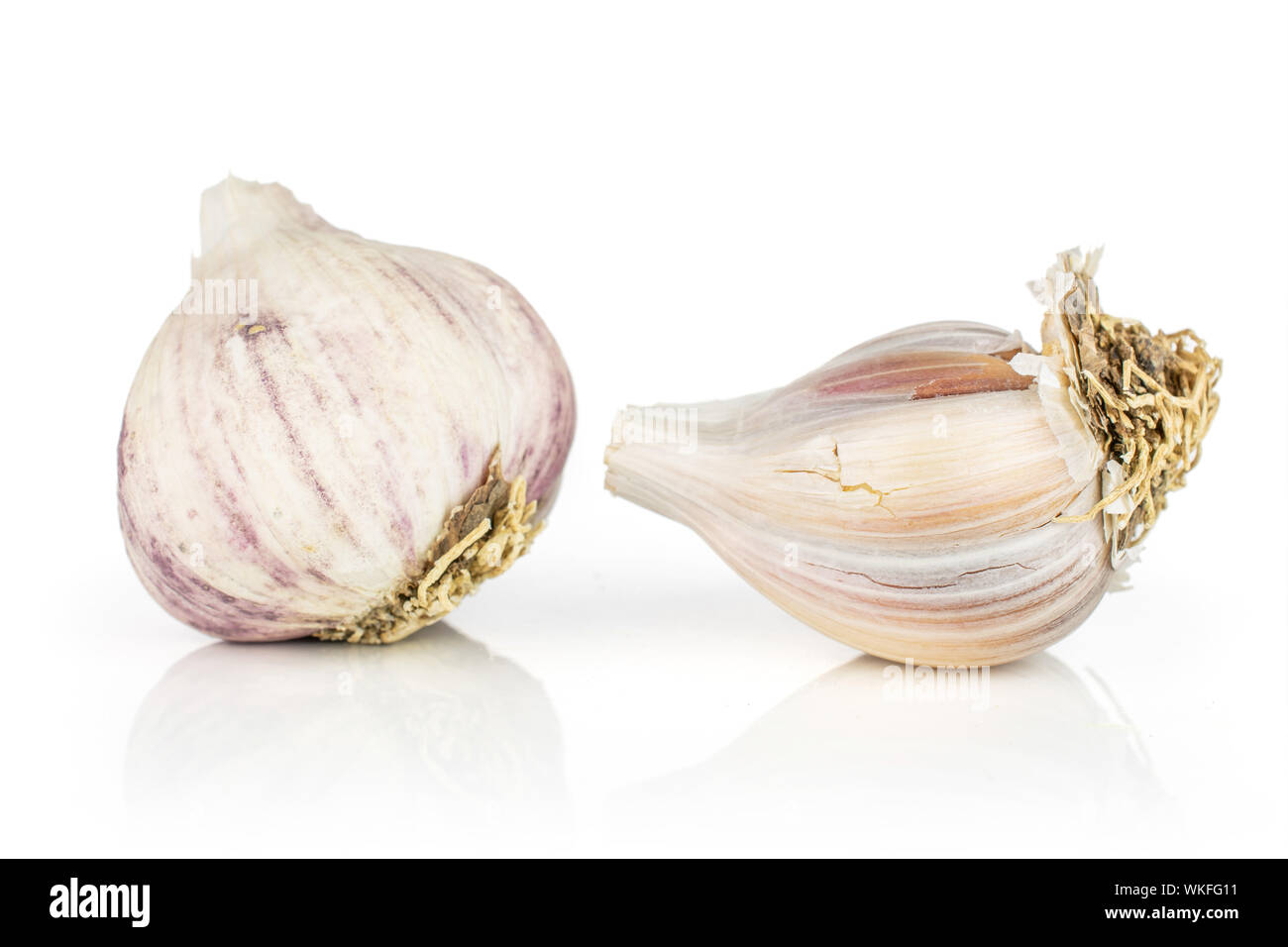 Group of one whole one half of organic white garlic allium sativum ...