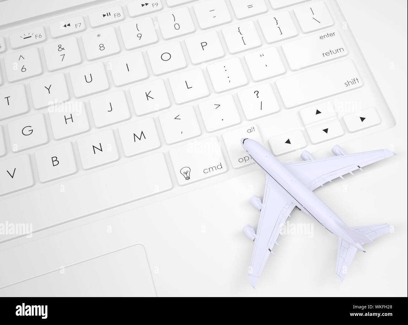 Airplane on the keyboard. View from above Stock Photo - Alamy