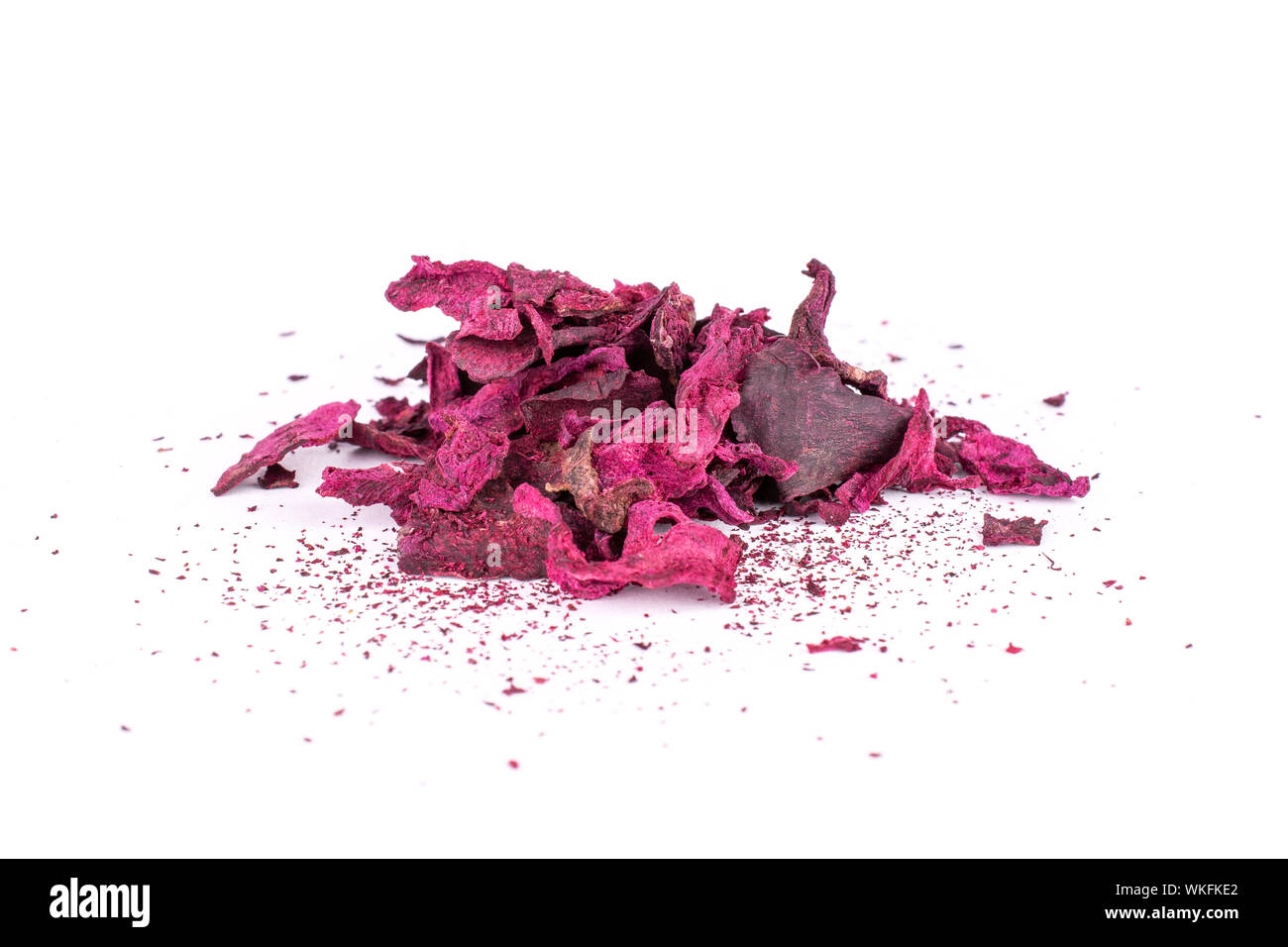 Lot of pieces of dried red beetroot isolated on white background Stock ...