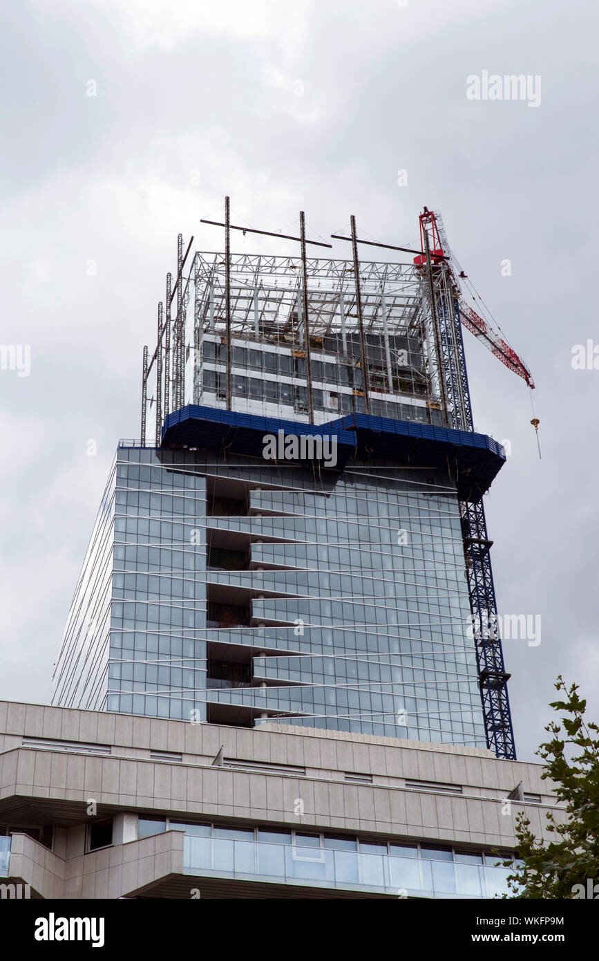 Modern office building under construction Stock Photo - Alamy