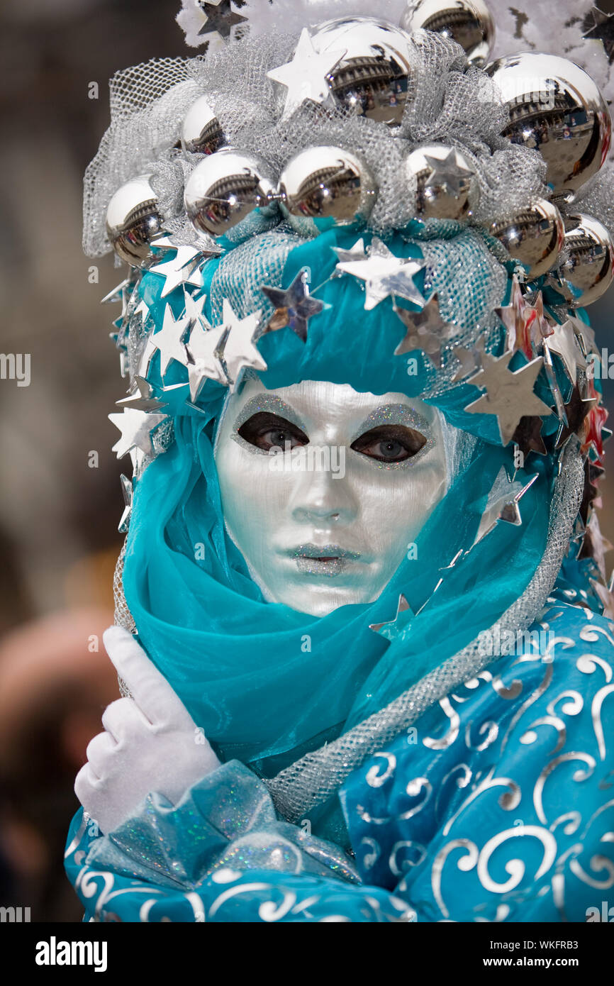 Turquoise and silver costume at the Venice Carnival Stock Photo - Alamy