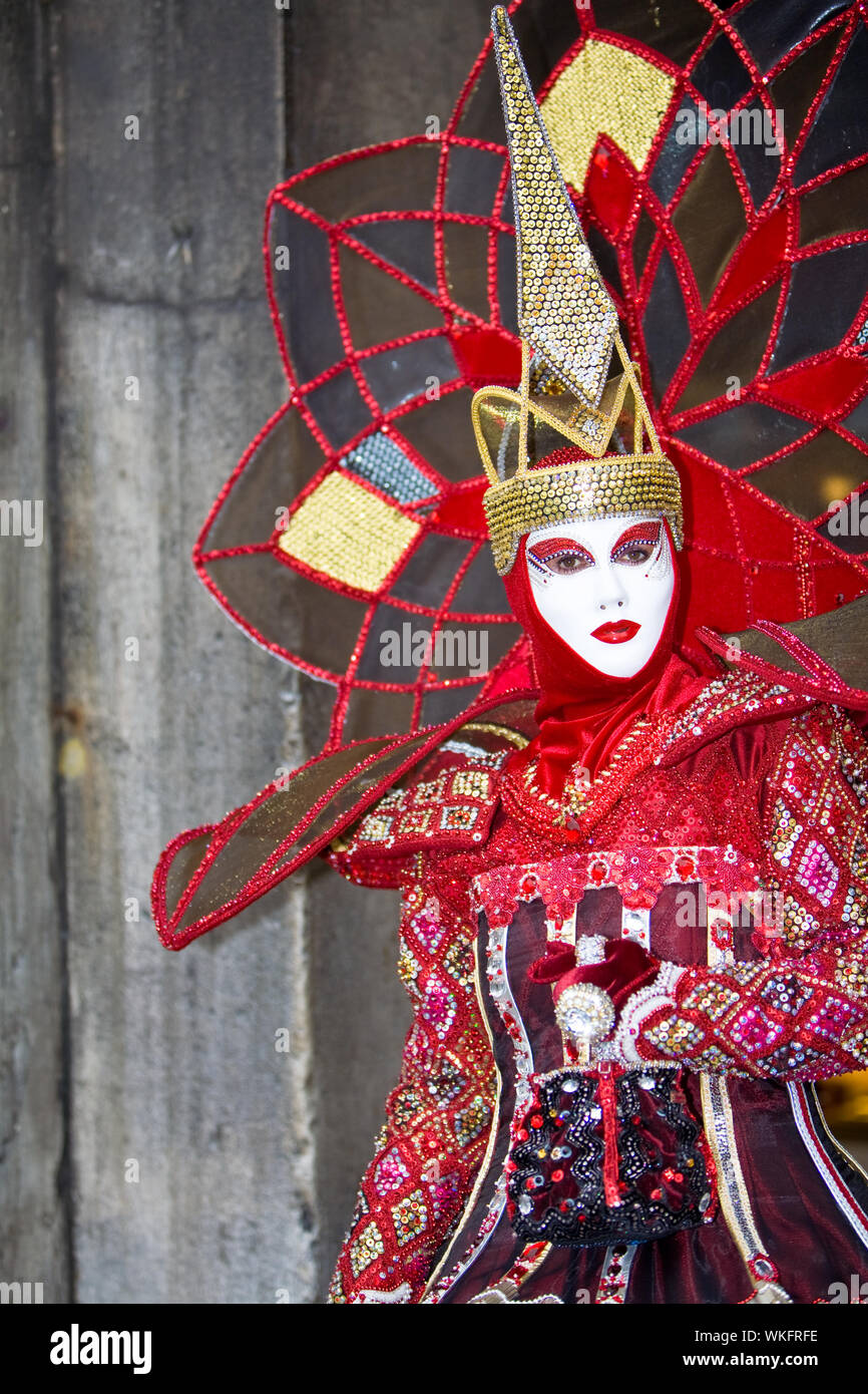 Woman in a fantastic red carnival costume Stock Photo - Alamy