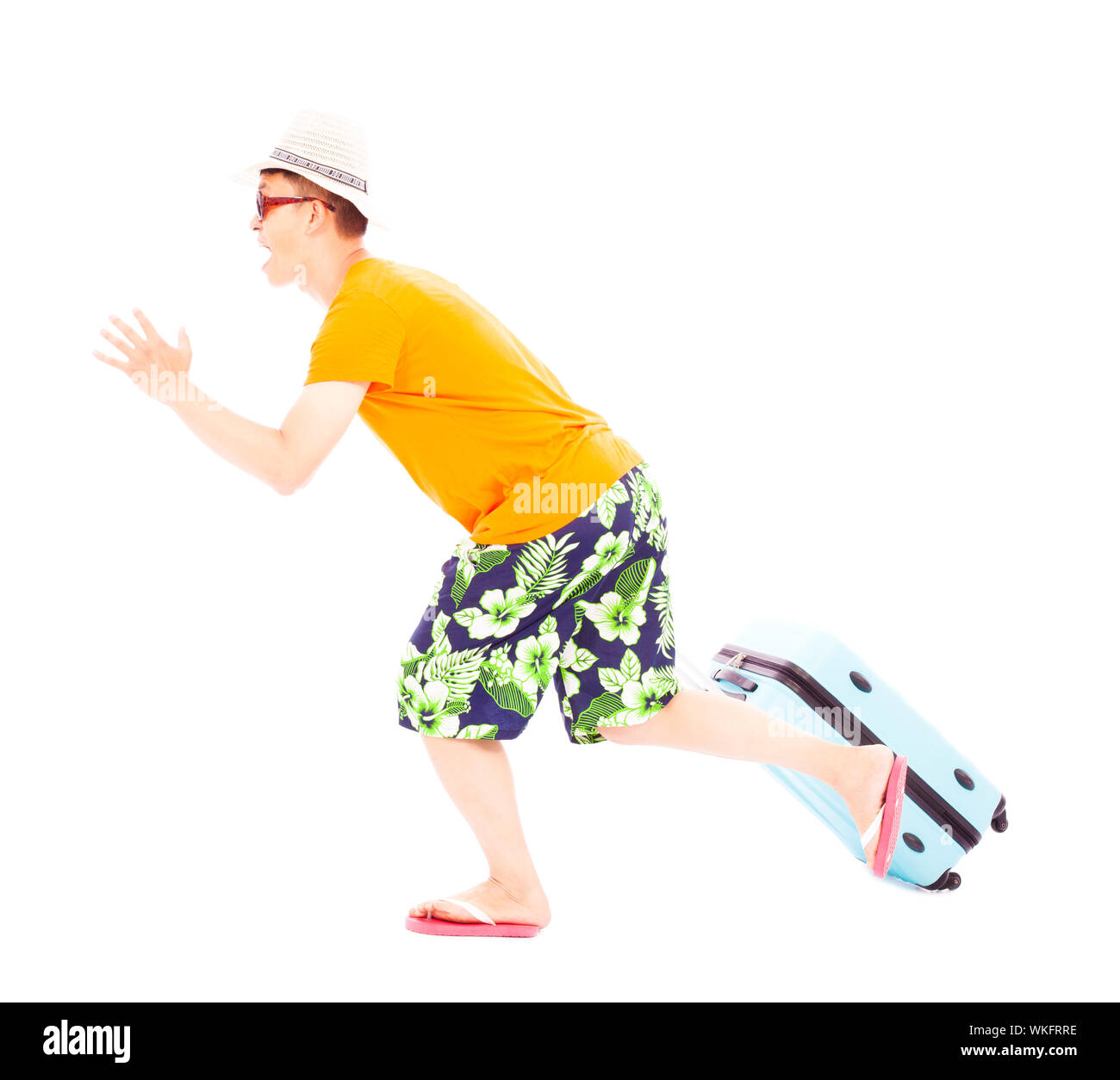 young backpacker pulling a baggage to travel worldwide Stock Photo - Alamy