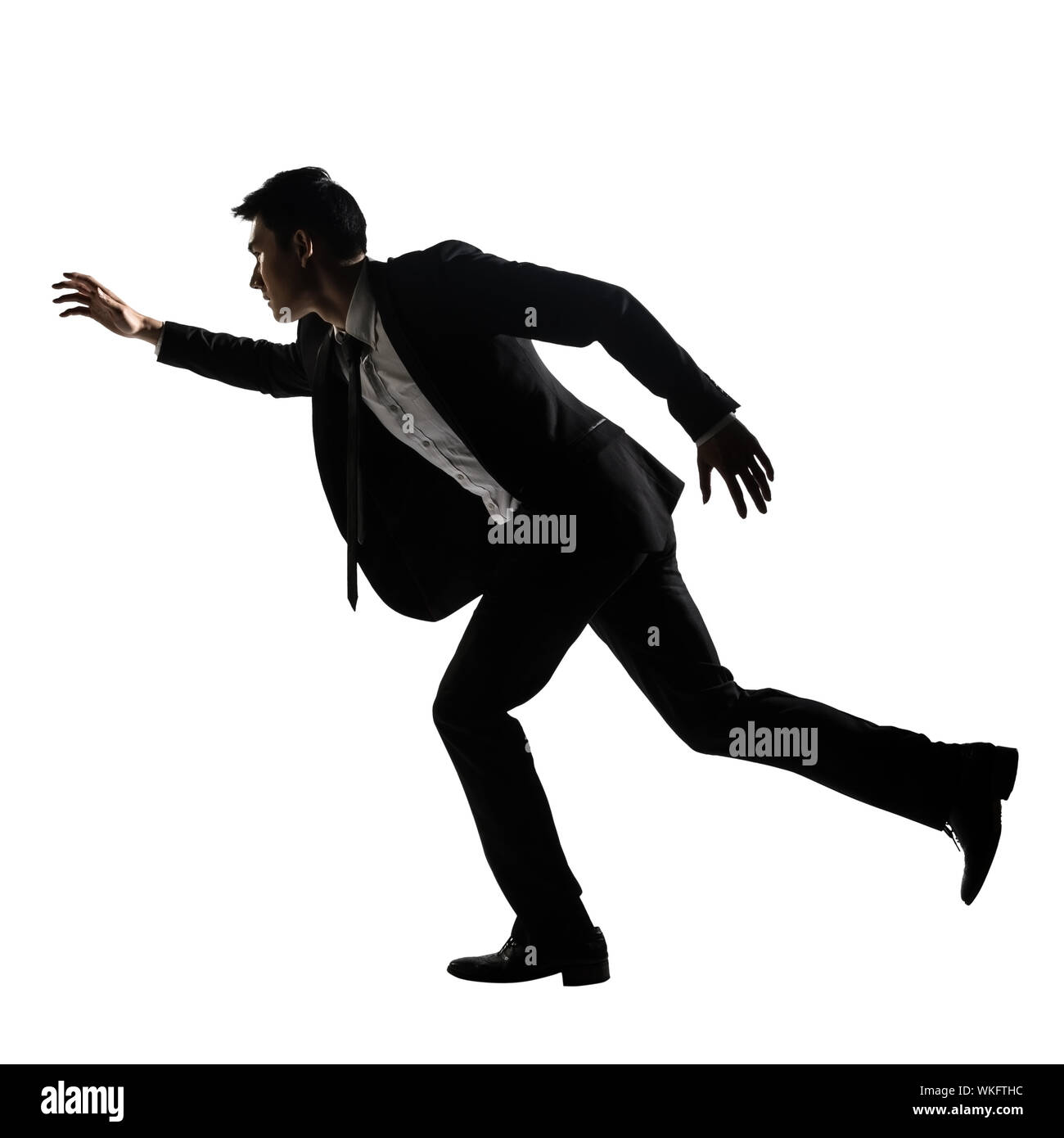 Man In Suit Running Silhouette